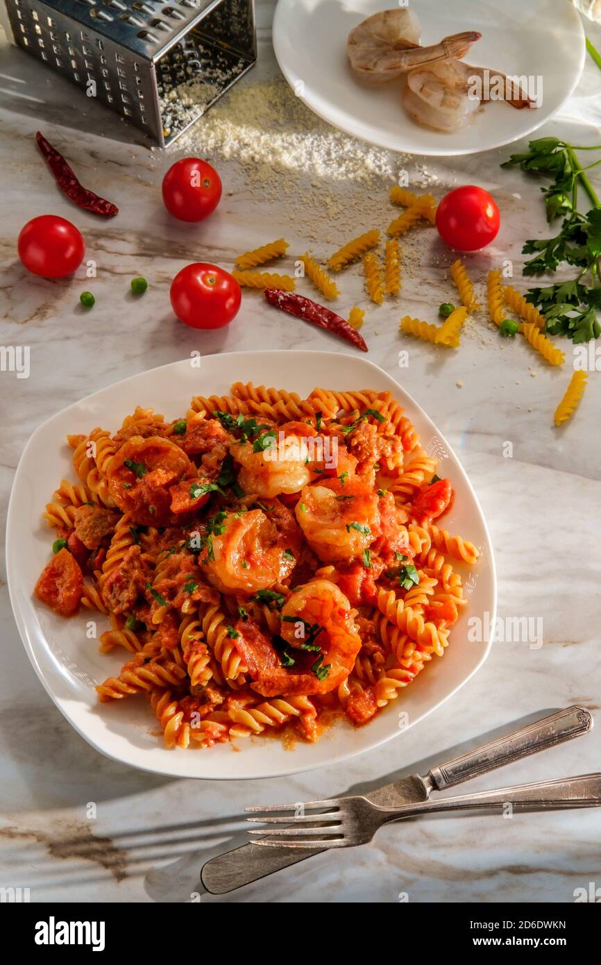 Fusilli pasta in creamy vodka tomato sauce with sausage shrimp and ...