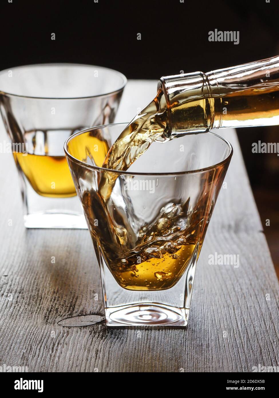 Whisky being poured glass hi-res stock photography and images - Alamy