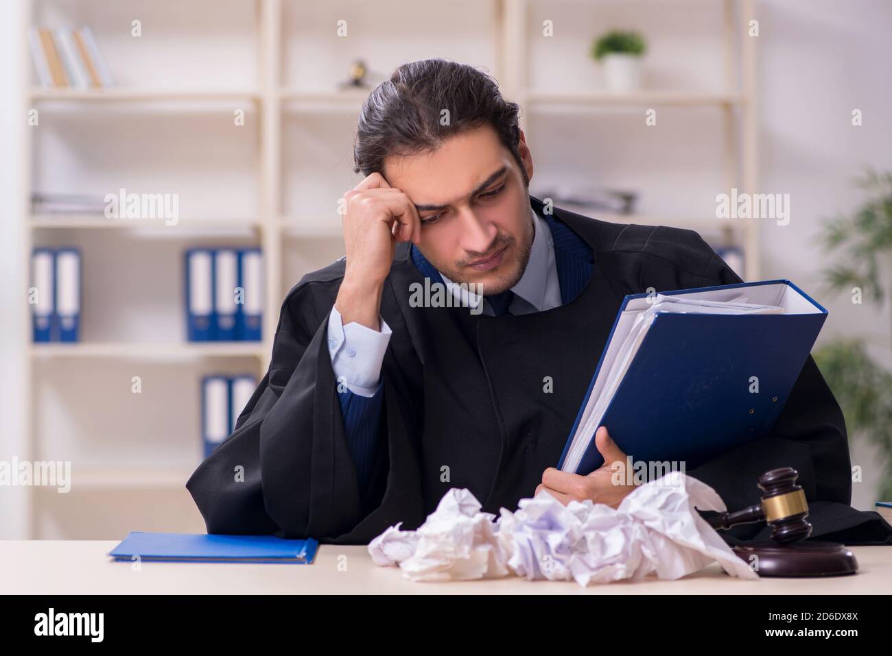 Young judge working in courthouse Stock Photo - Alamy