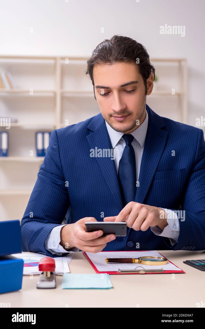 Young financial manager in the office Stock Photo - Alamy