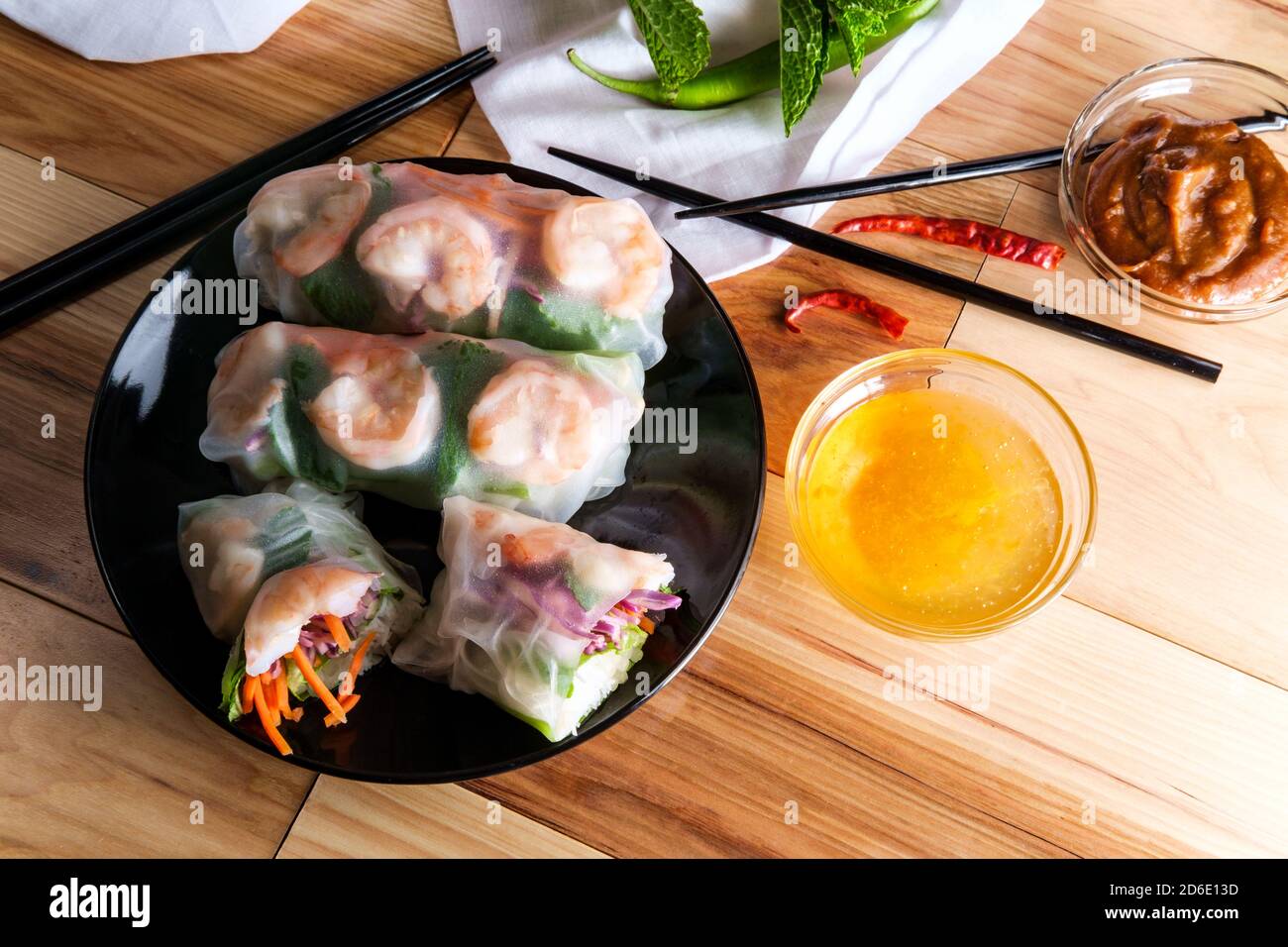 Fresh sliced vietnamese shrimp and vegetable spring rolls with peanut ...