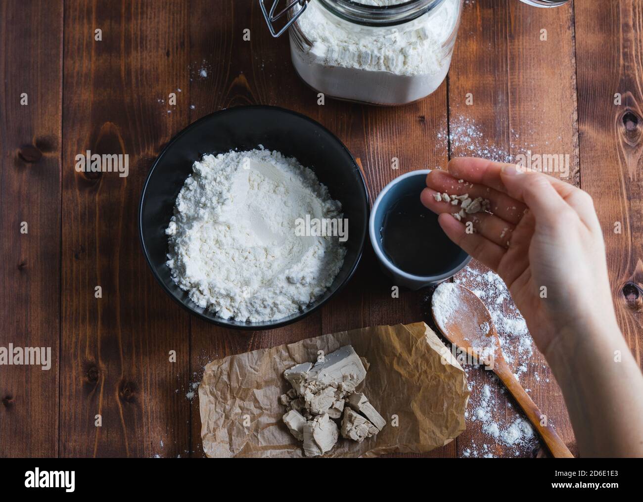Housewife adding yeast flour hi-res stock photography and images - Alamy