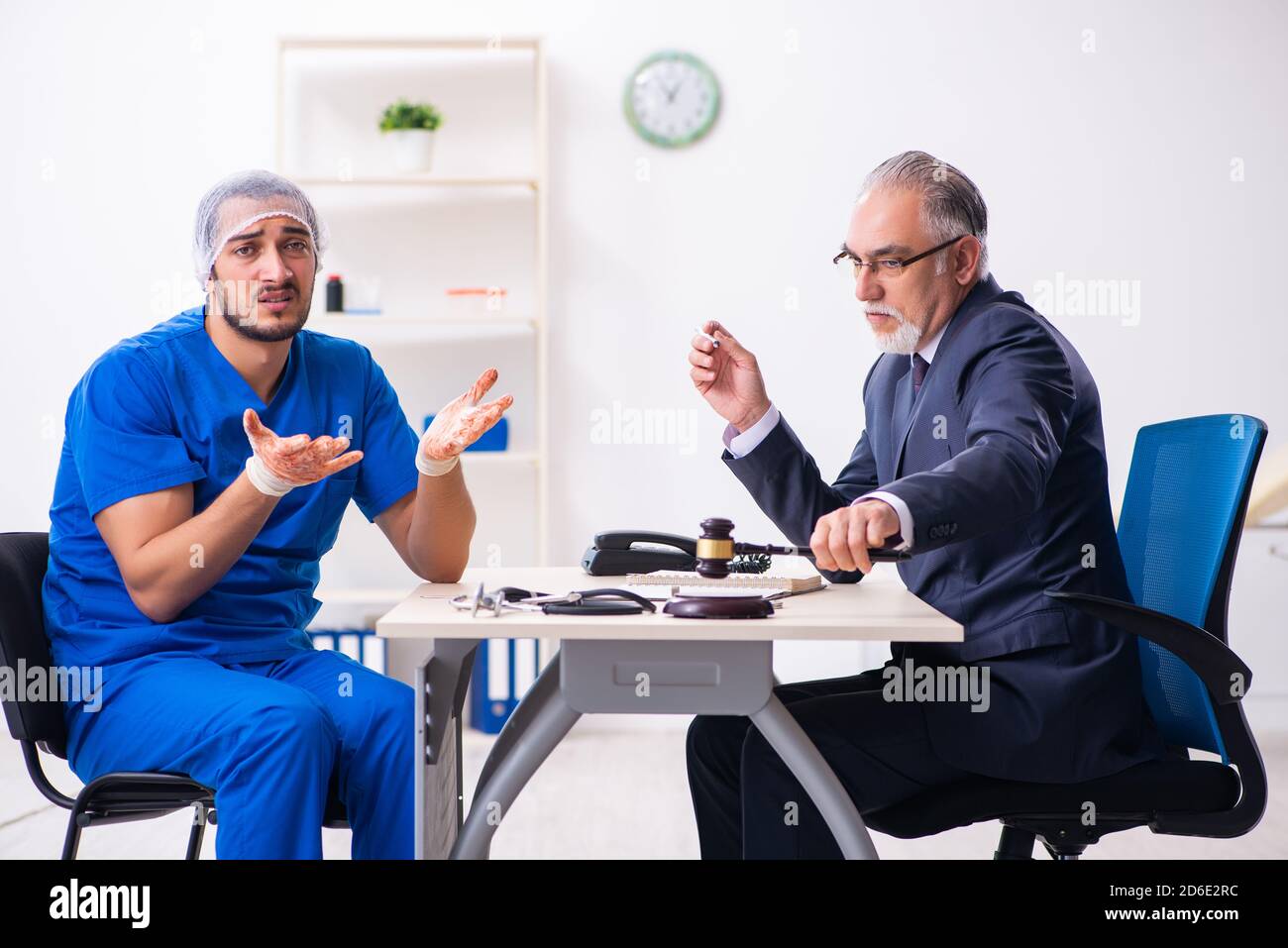 Doctor in courthouse meeting with advocate Stock Photo - Alamy