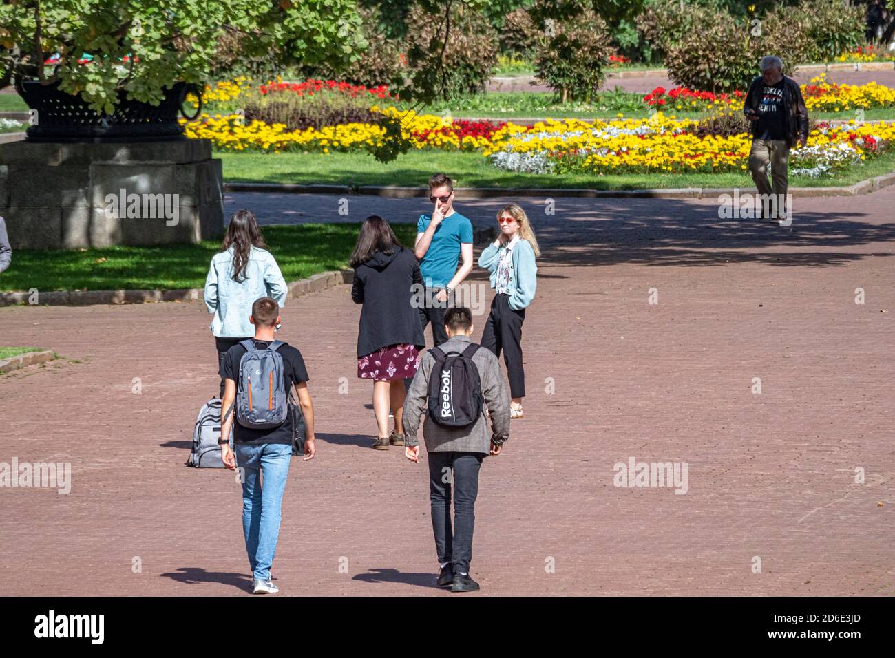 Russia, Moscow. Students in the park near Moscow University main ...