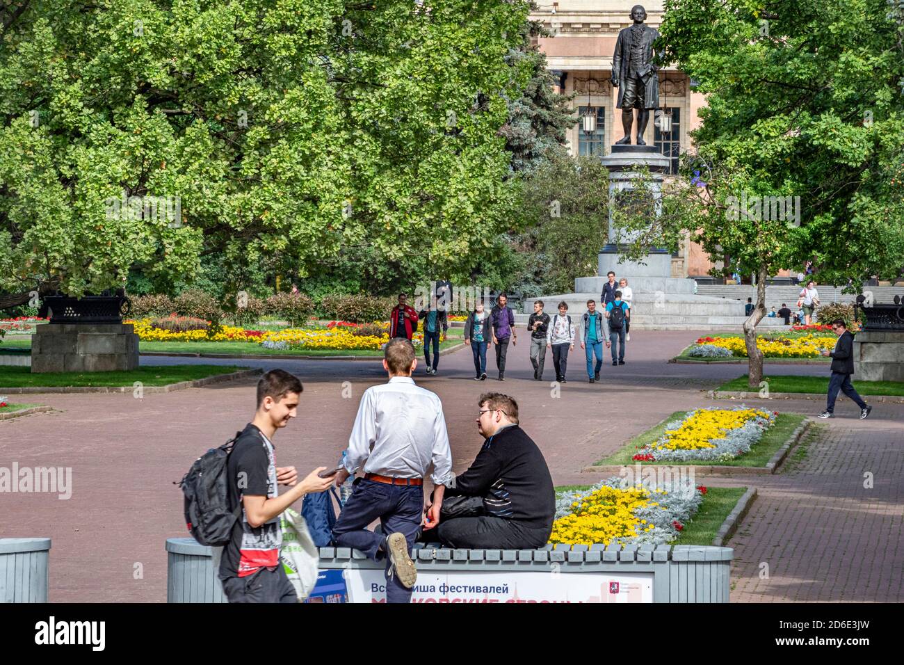 Russia, Moscow. Students in the park near Moscow University main ...