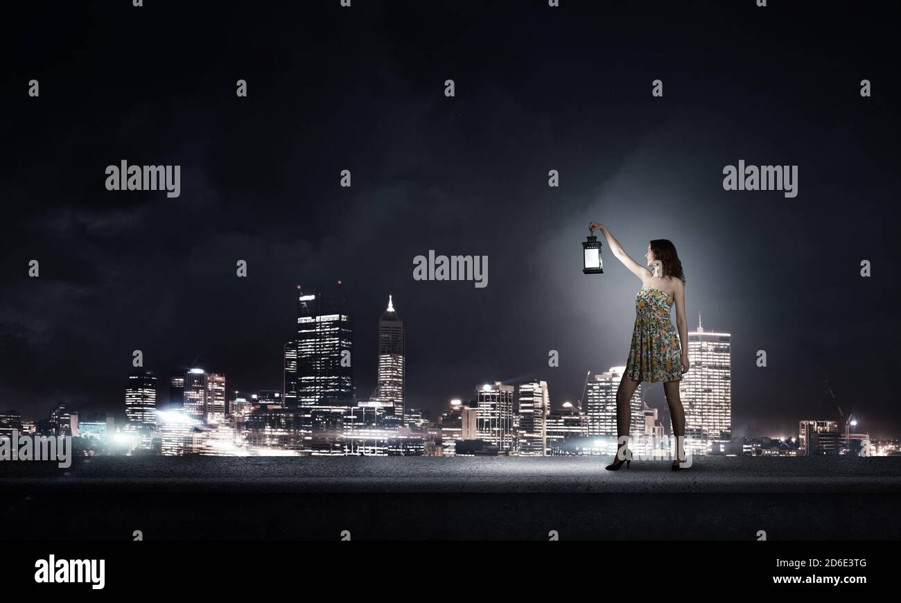 Girl lost in darkness Stock Photo - Alamy