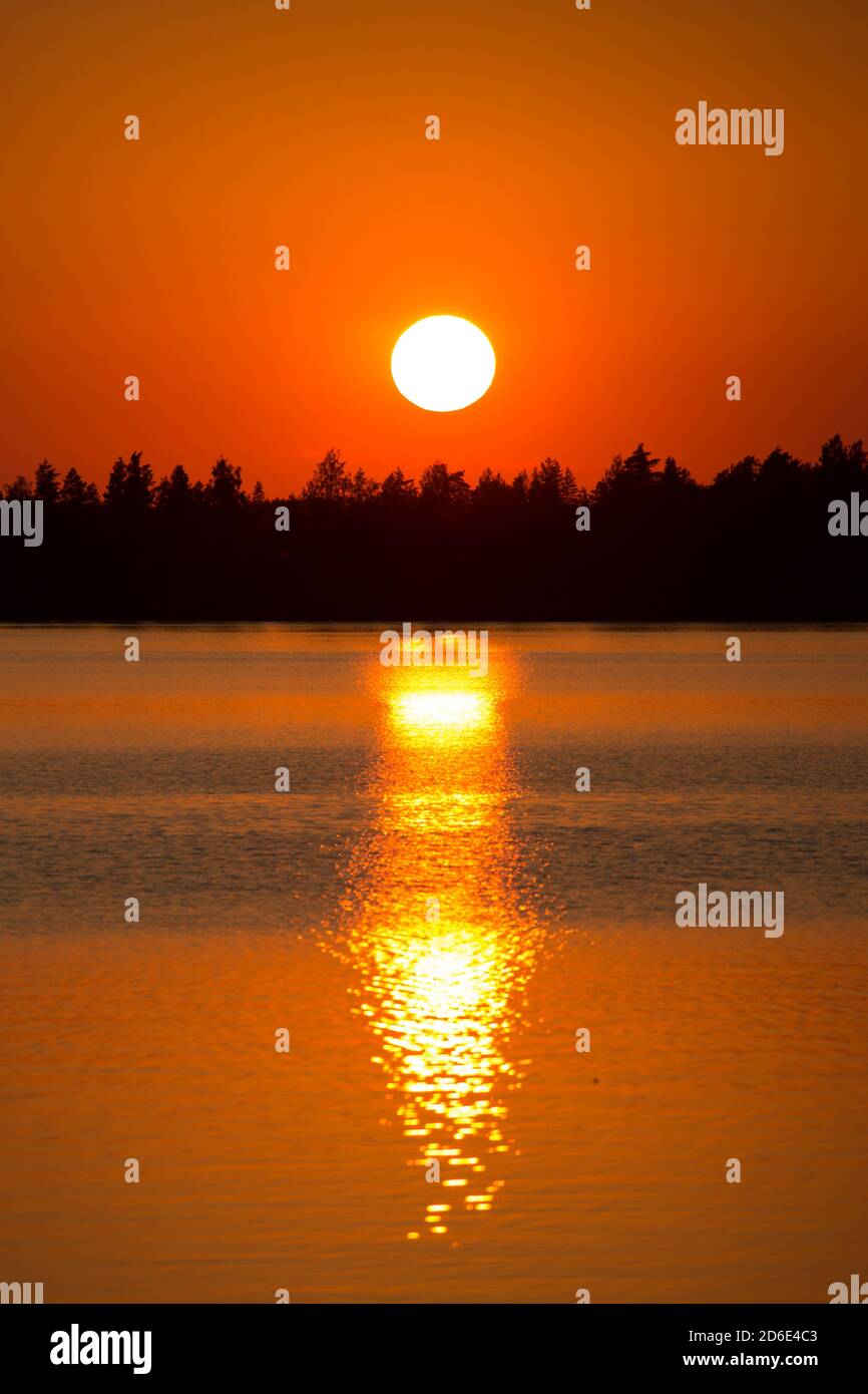 Beautiful lake reflecting orange hi-res stock photography and images ...