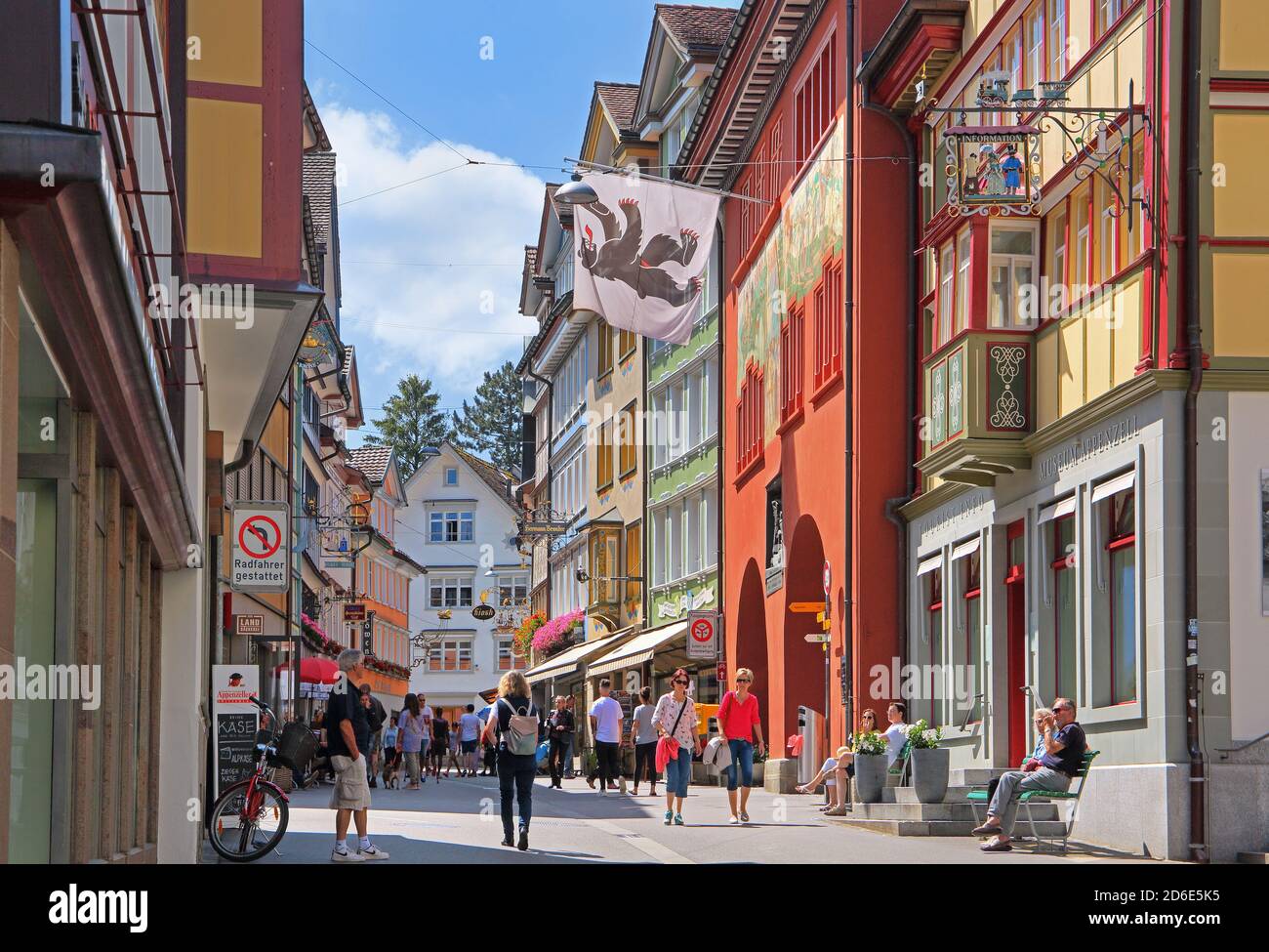 Pedestrian zone with typical brightly painted houses and town hall in ...