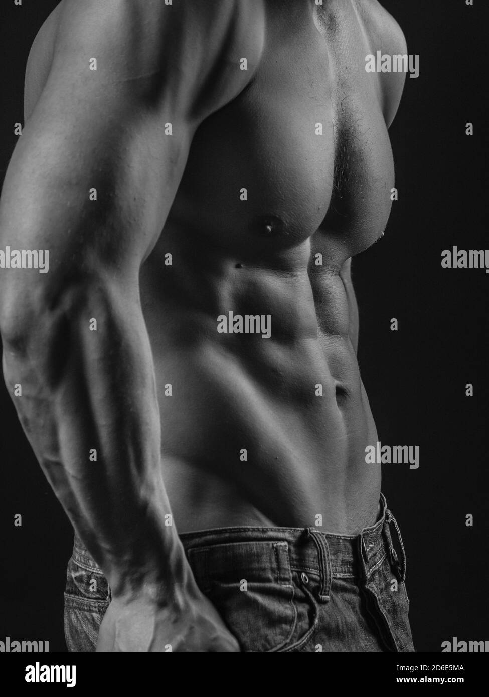 Perfectly shaped torso demonstraring abdominal muscles of a fit young ...