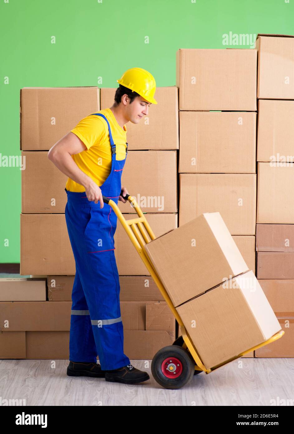 The man contractor working with boxes delivery Stock Photo - Alamy
