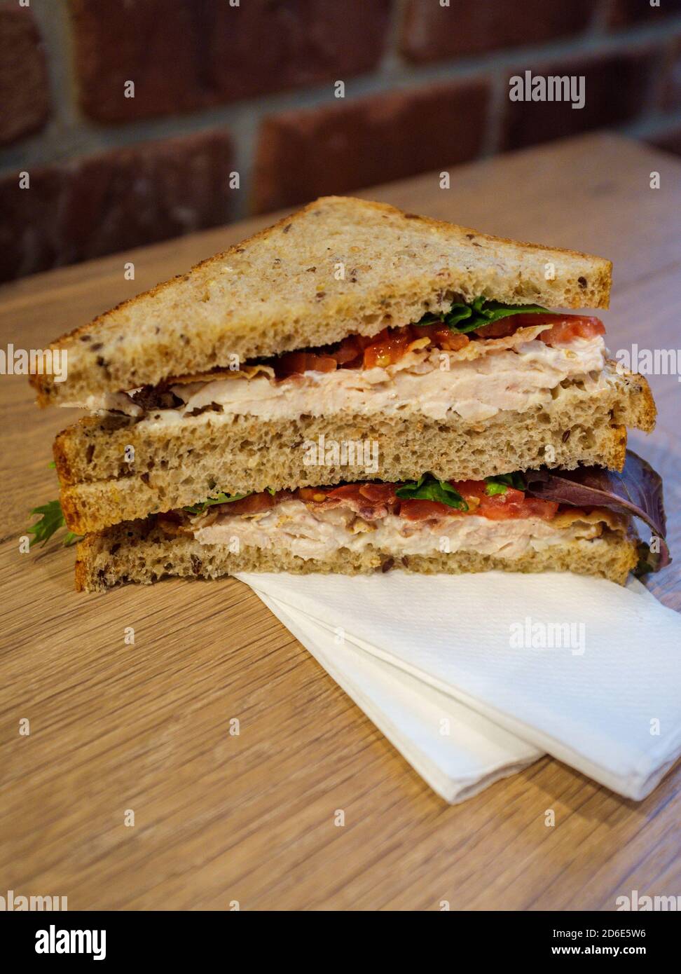Chicken bacon lettuce and tomato sandwich on whole wheat rye bread ...