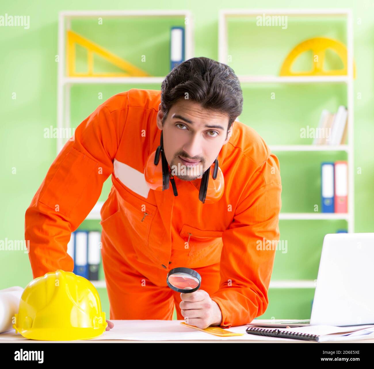 The construction supervisor planning new project in office Stock Photo ...