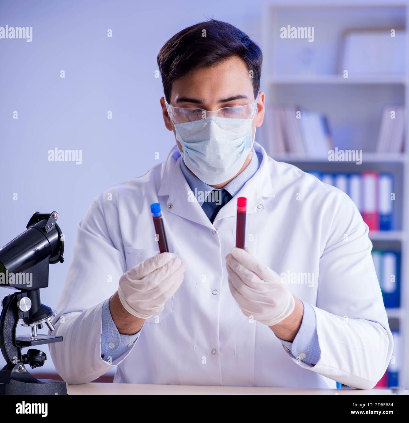 The lab assistant testing blood samples in hospital Stock Photo - Alamy