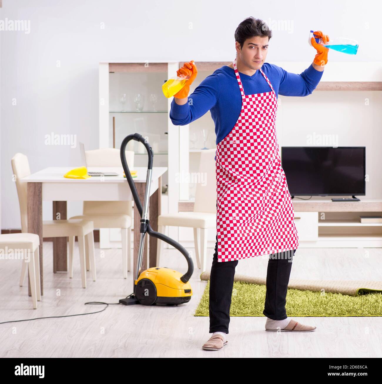The contractor man cleaning house doing chores Stock Photo - Alamy
