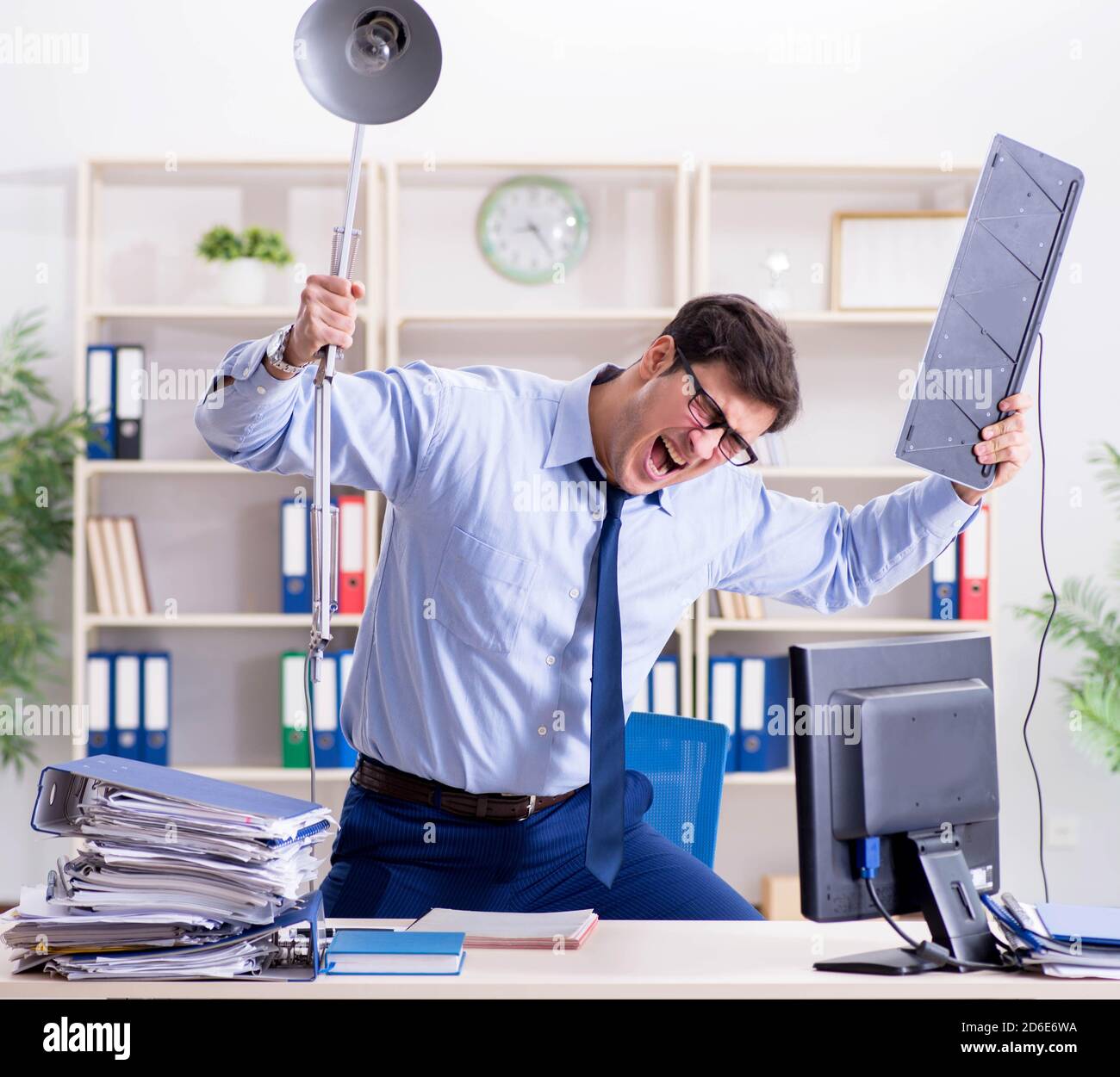 The angry businessman frustrated with too much work Stock Photo - Alamy