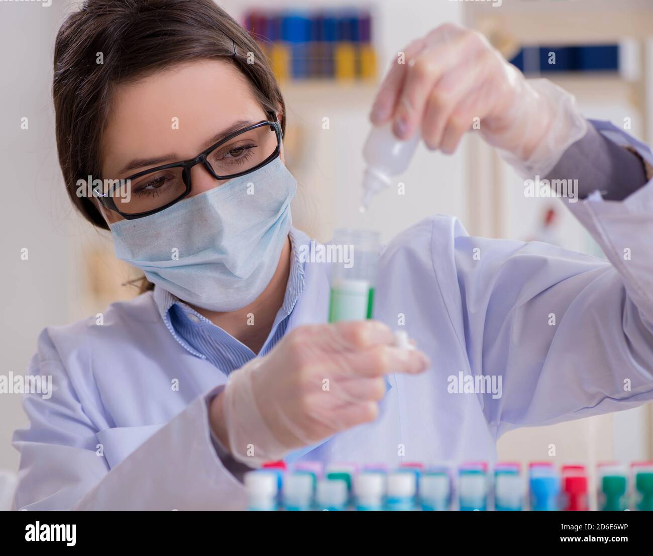 The female chemist working in hospital lab Stock Photo - Alamy