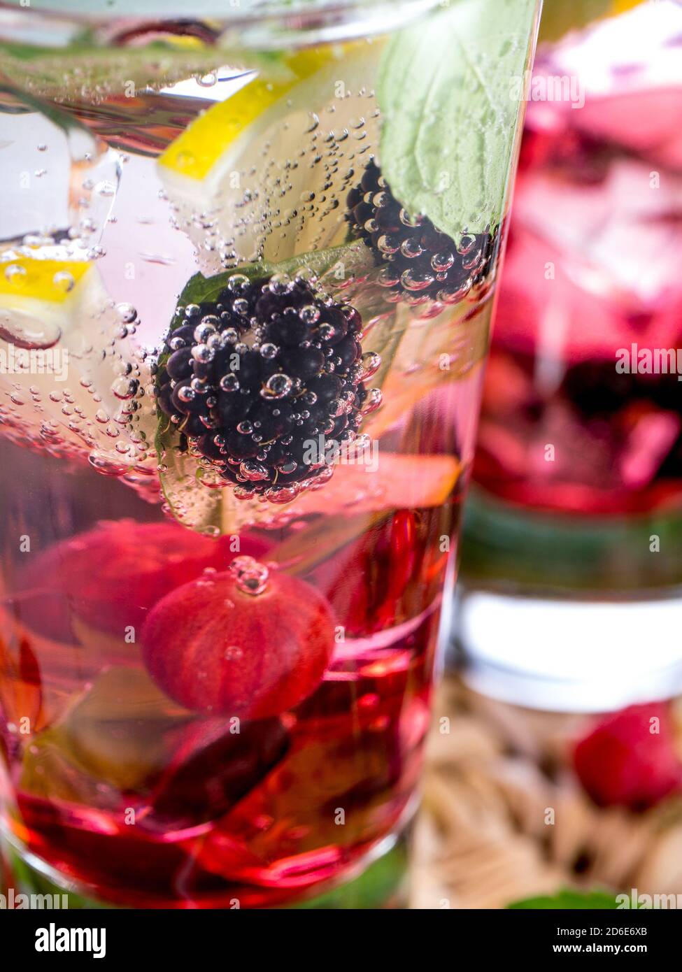 Fresh berry lemonade with red currant, gooseberry and blackberry Stock ...