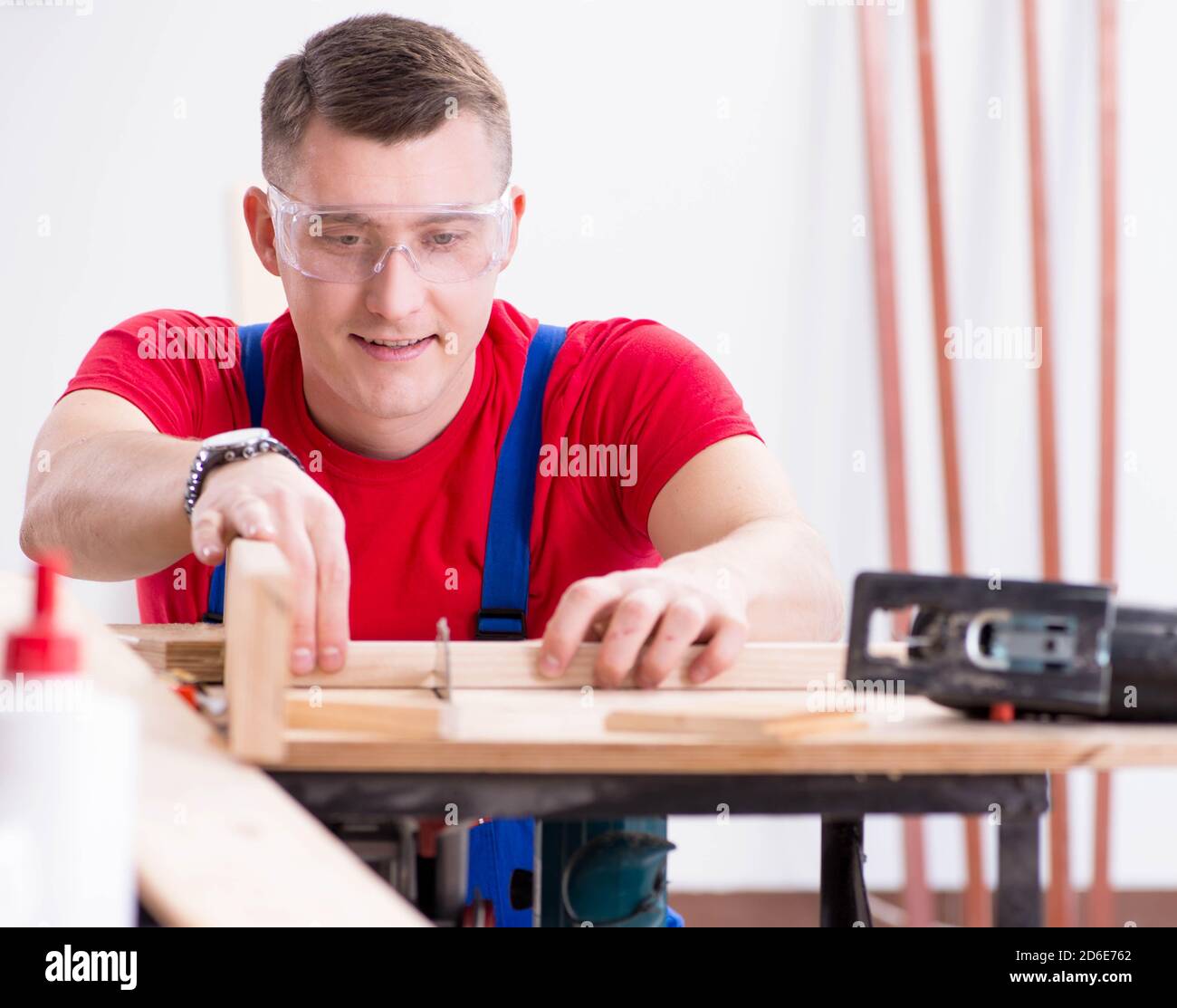 The contractor working in the workshop Stock Photo - Alamy