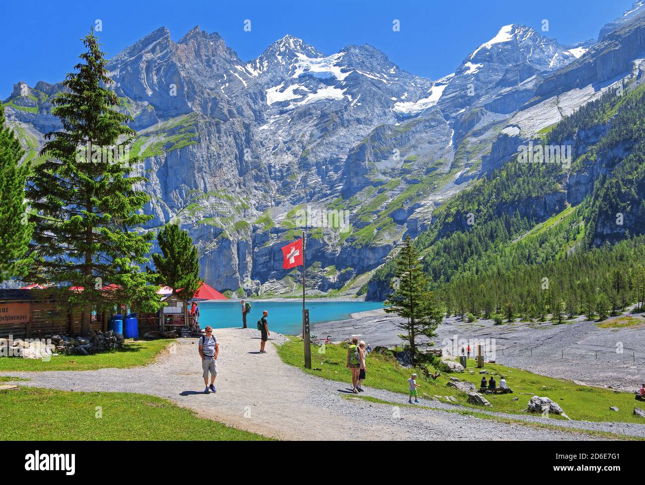 Hiking trail on Oeschinensee with the Blüemlisalp massif (3661m ...