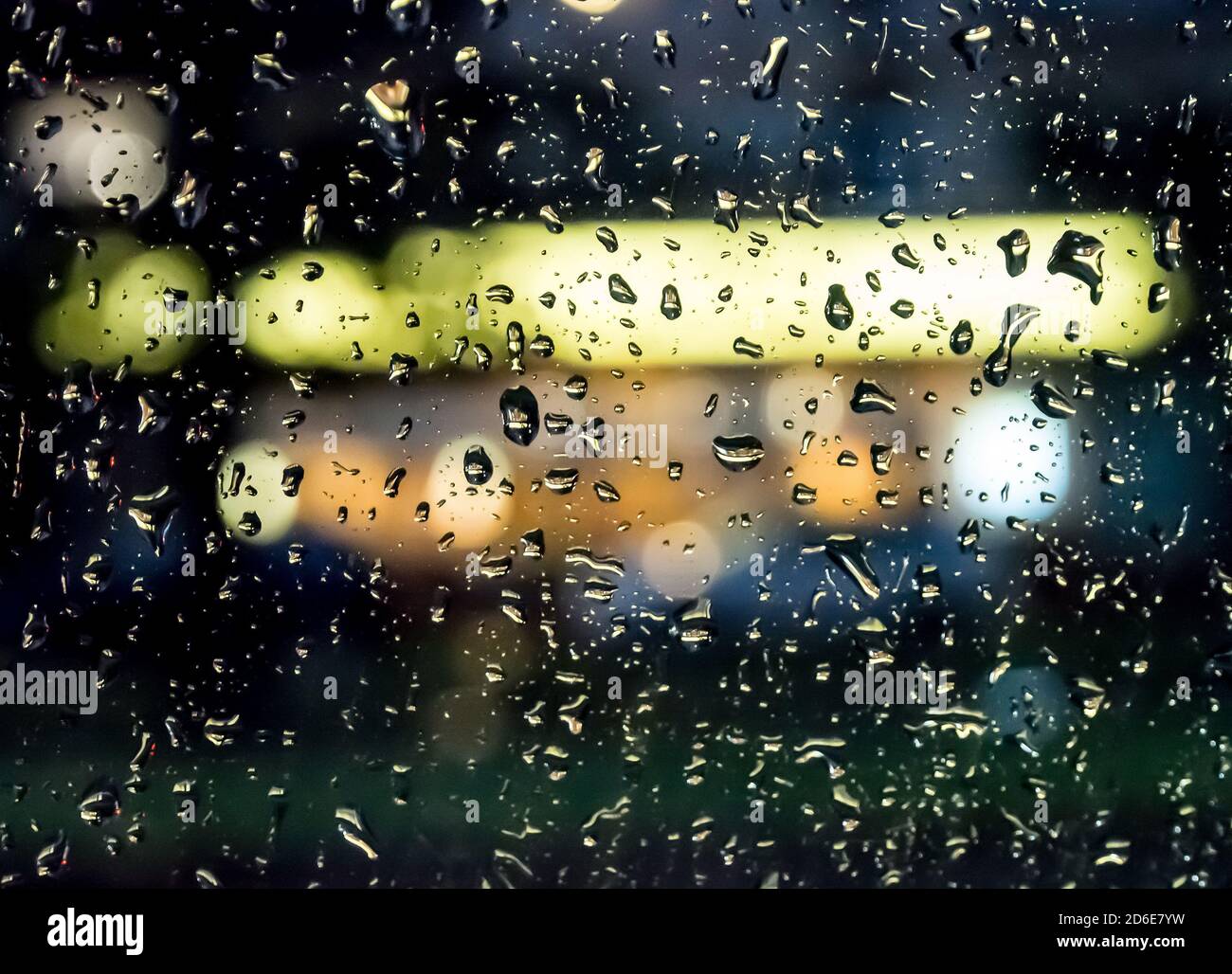 Stormy night in the city through a rainy window Stock Photo - Alamy