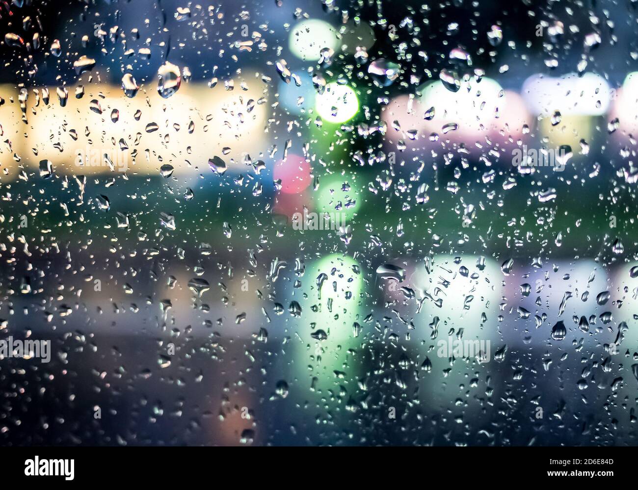 City through rainy window at night hi-res stock photography and images ...