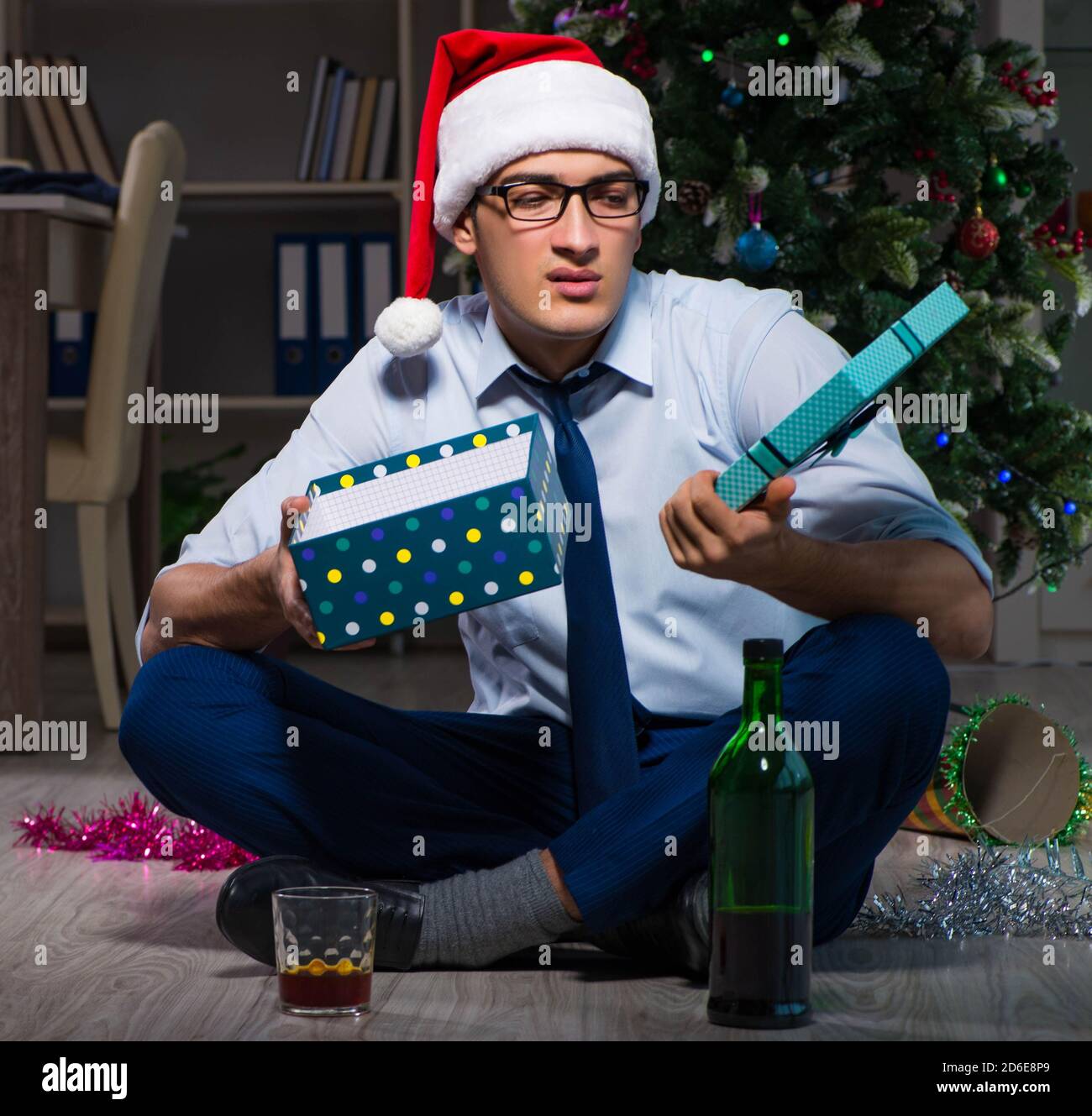 The businessman celebrating christmas at home alone Stock Photo - Alamy