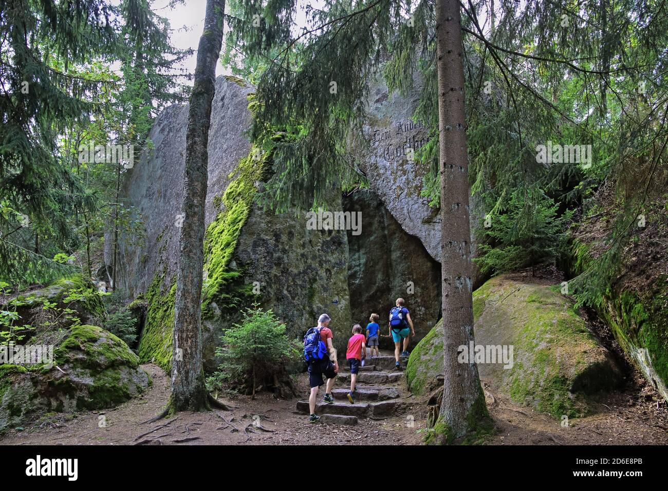 Luisenburg rock labyrinth with hikers at the Goethefelsen, Wunsiedel ...
