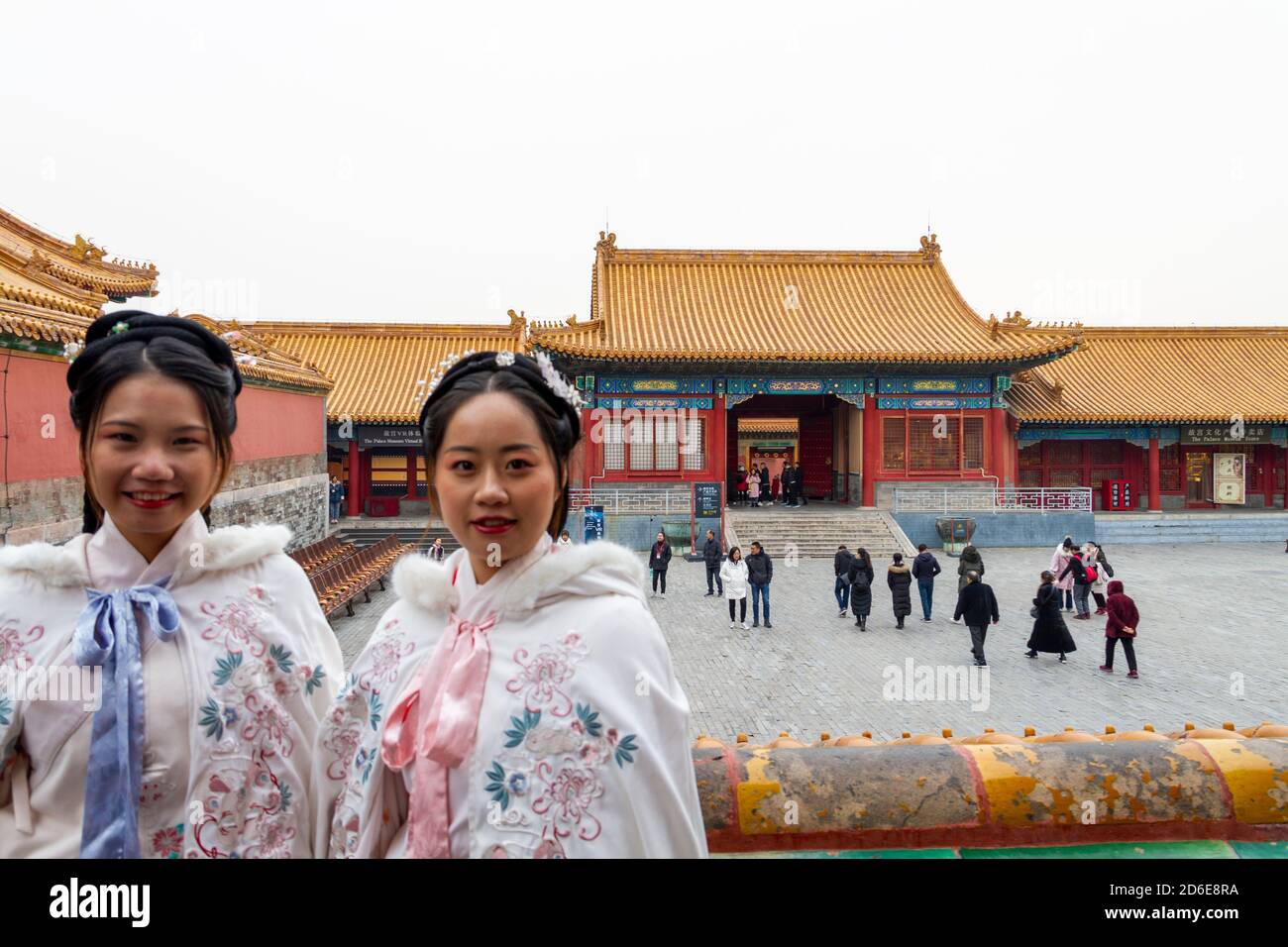 Beijing, China - November 21 2019: Two young Chinese women pose dressed ...