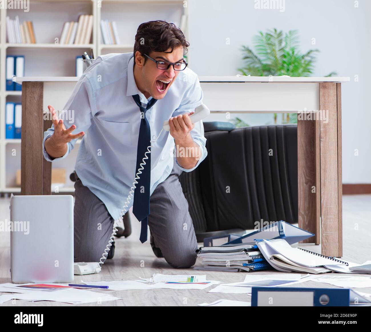 The bankrupt businessman angry in the office floor Stock Photo - Alamy