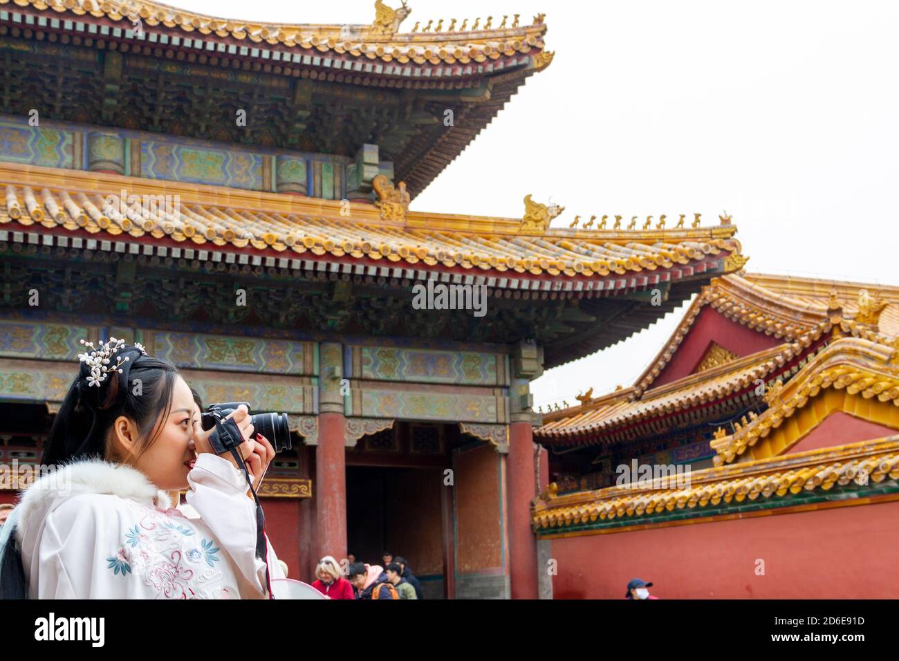 Beijing, China - November 21 2019: A young Chinese woman dressed in ...