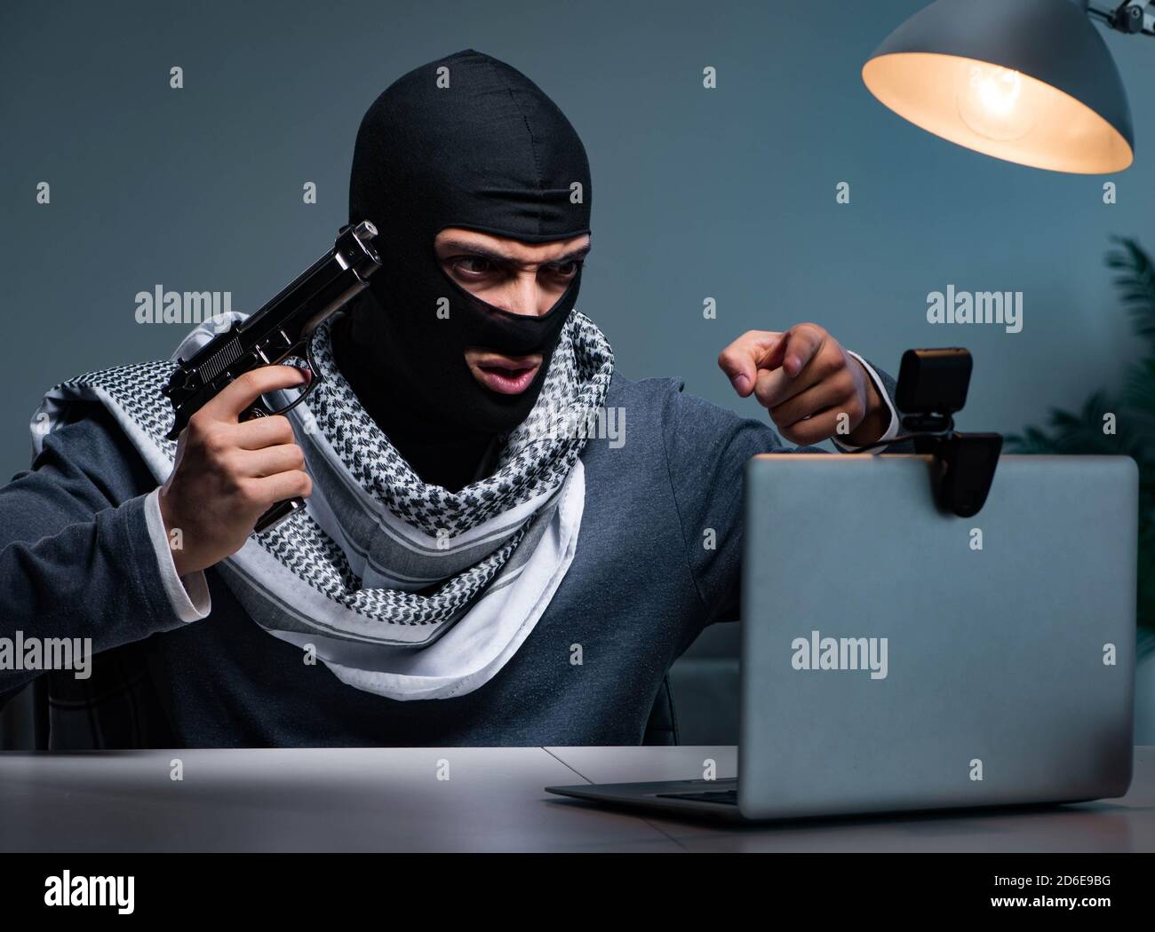 Pointing gun at computer hi-res stock photography and images - Alamy