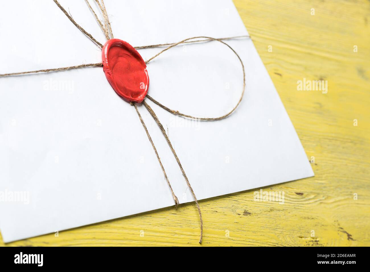 Letter with seal on table Stock Photo - Alamy