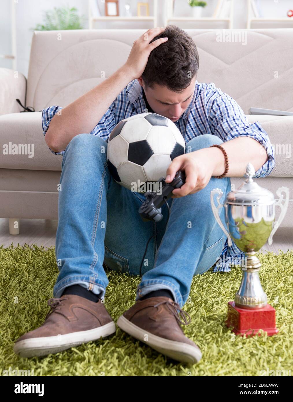 The young man playing computer games at home Stock Photo - Alamy