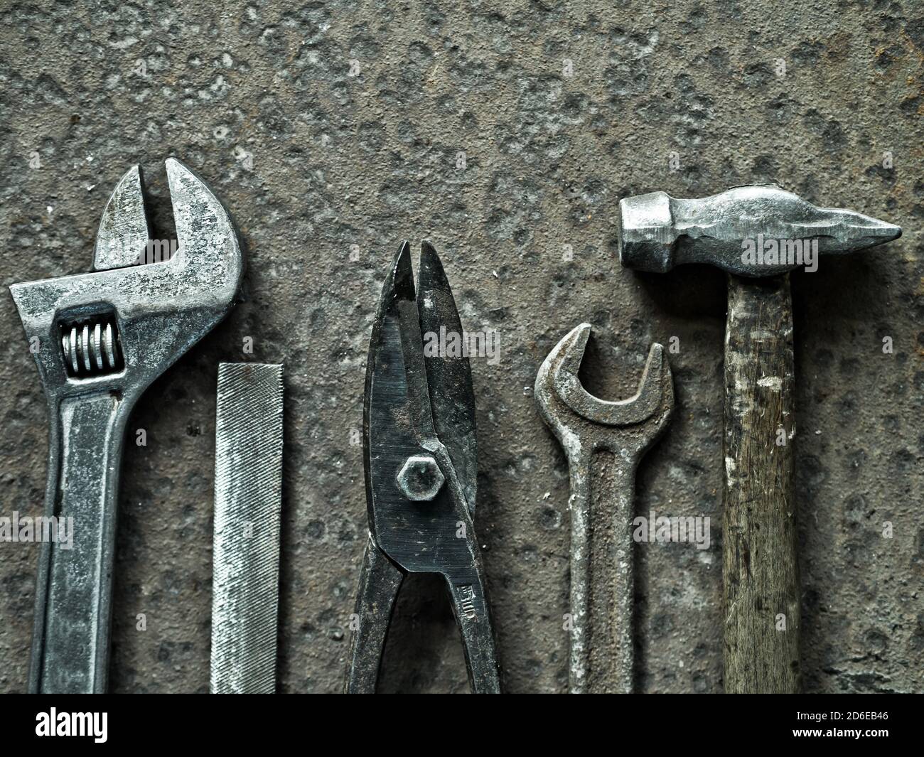 Old tools on a rusty metal background Stock Photo - Alamy