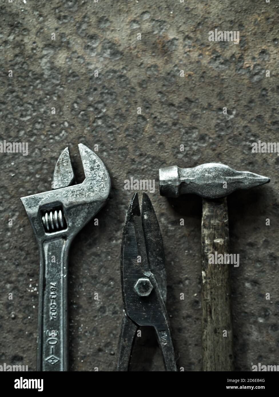 Old tools on a rusty metal background Stock Photo - Alamy