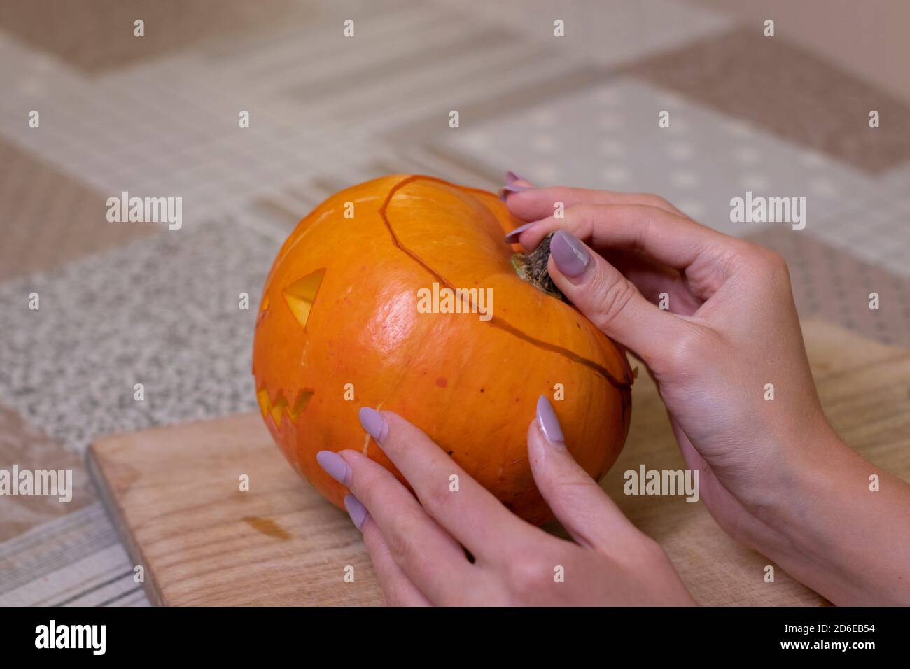 the process of making a Halloween pumpkin. horror theme and Hallowe'en ...