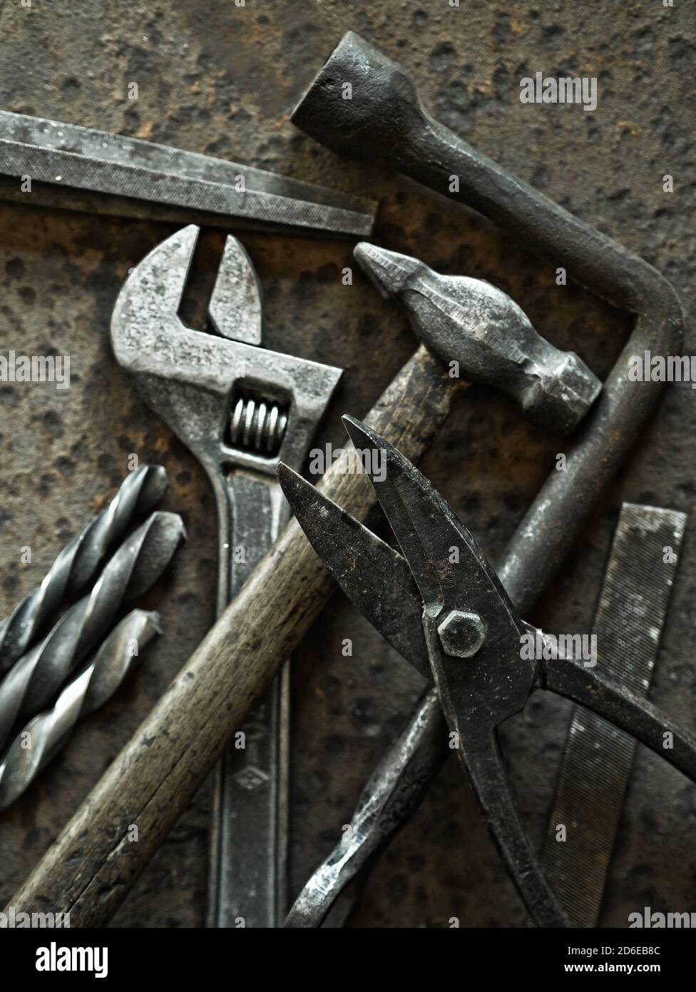 Old tools on a rusty metal background Stock Photo - Alamy