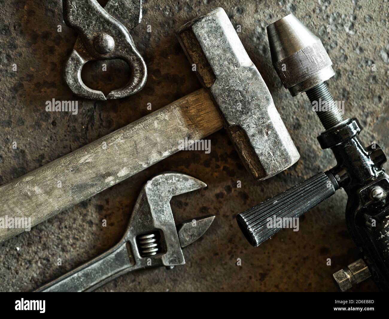 Old tools over rusty metal background Stock Photo - Alamy