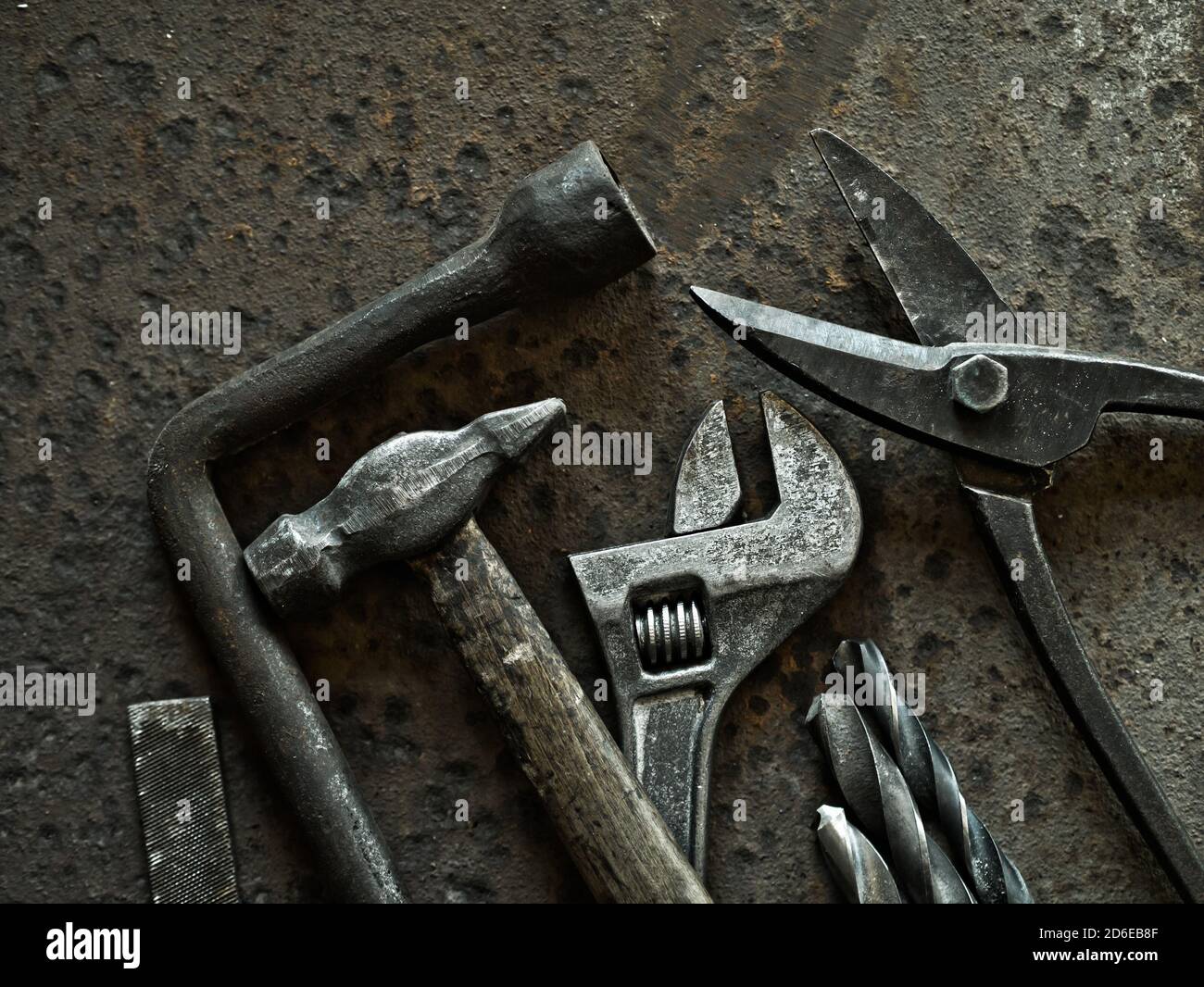 Old tools on a rusty metal background Stock Photo - Alamy