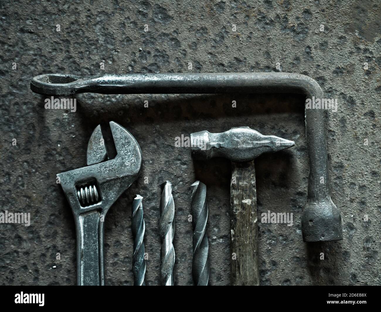 Old tools on a rusty metal background Stock Photo - Alamy