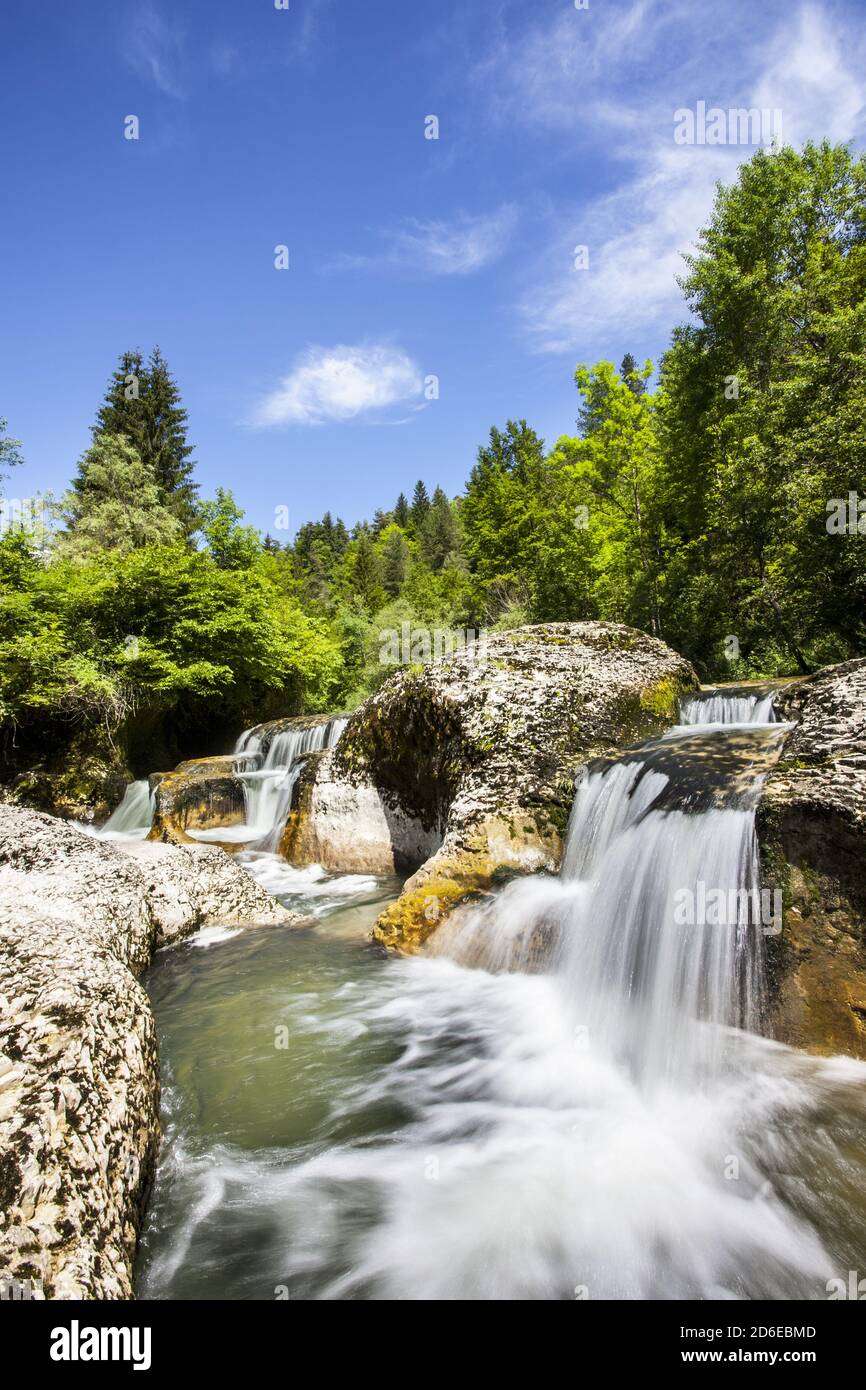 Small mountain waterfall on the rocks in Ain, France Stock Photo - Alamy