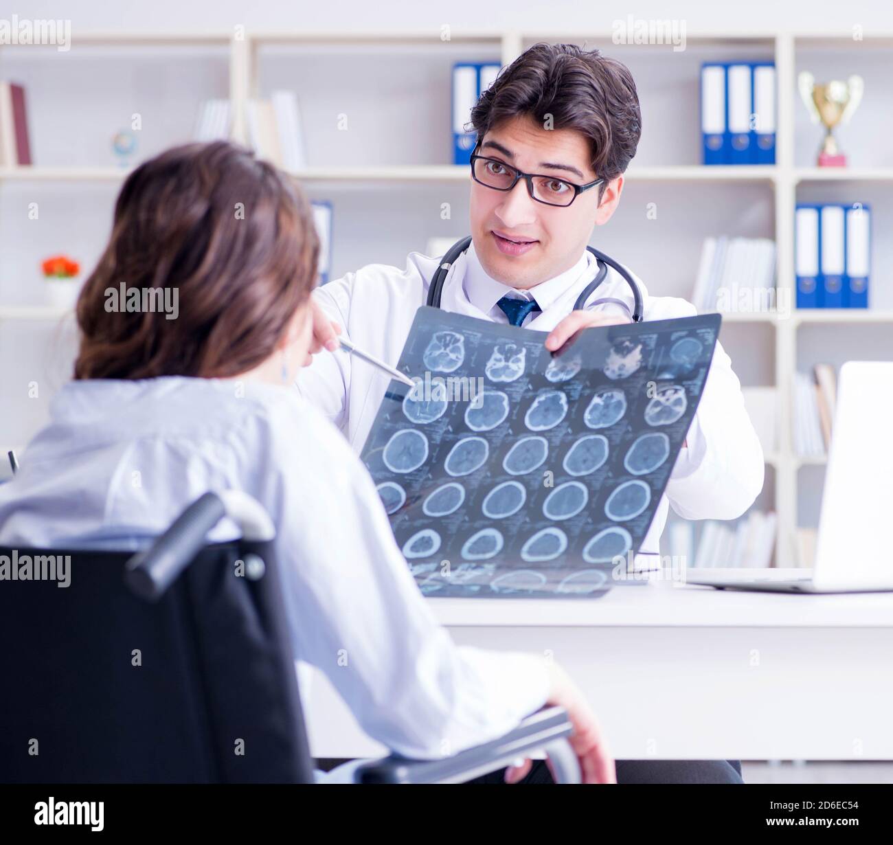 The doctor explaining to patient results of x-ray imaging Stock Photo ...