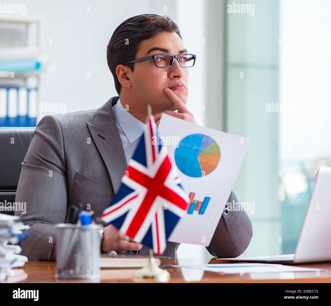 The businessman with british flag in the office Stock Photo - Alamy