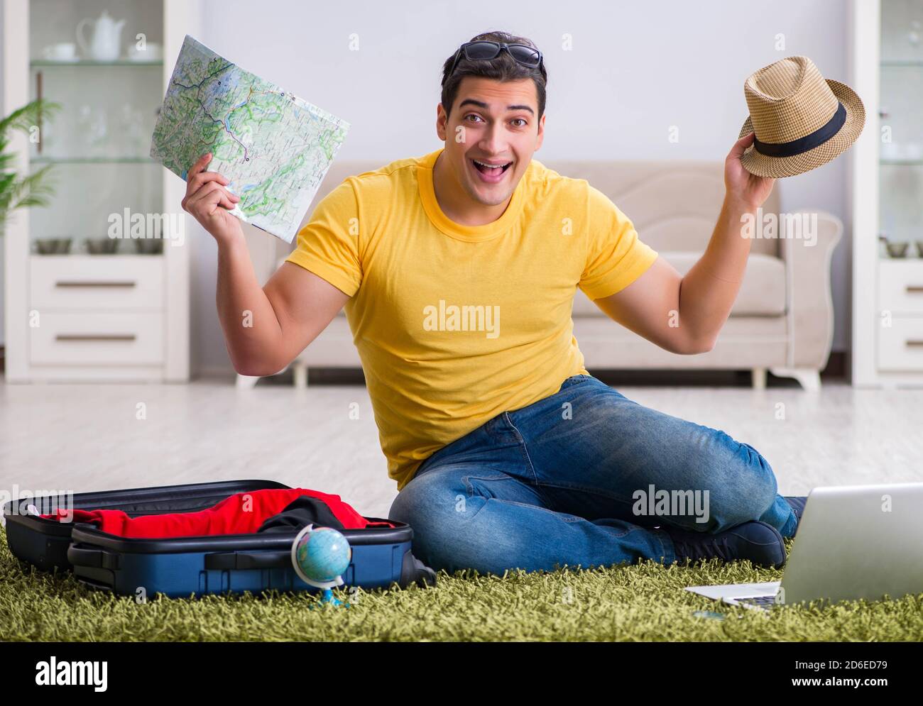 The man planning his vacation trip with map Stock Photo - Alamy