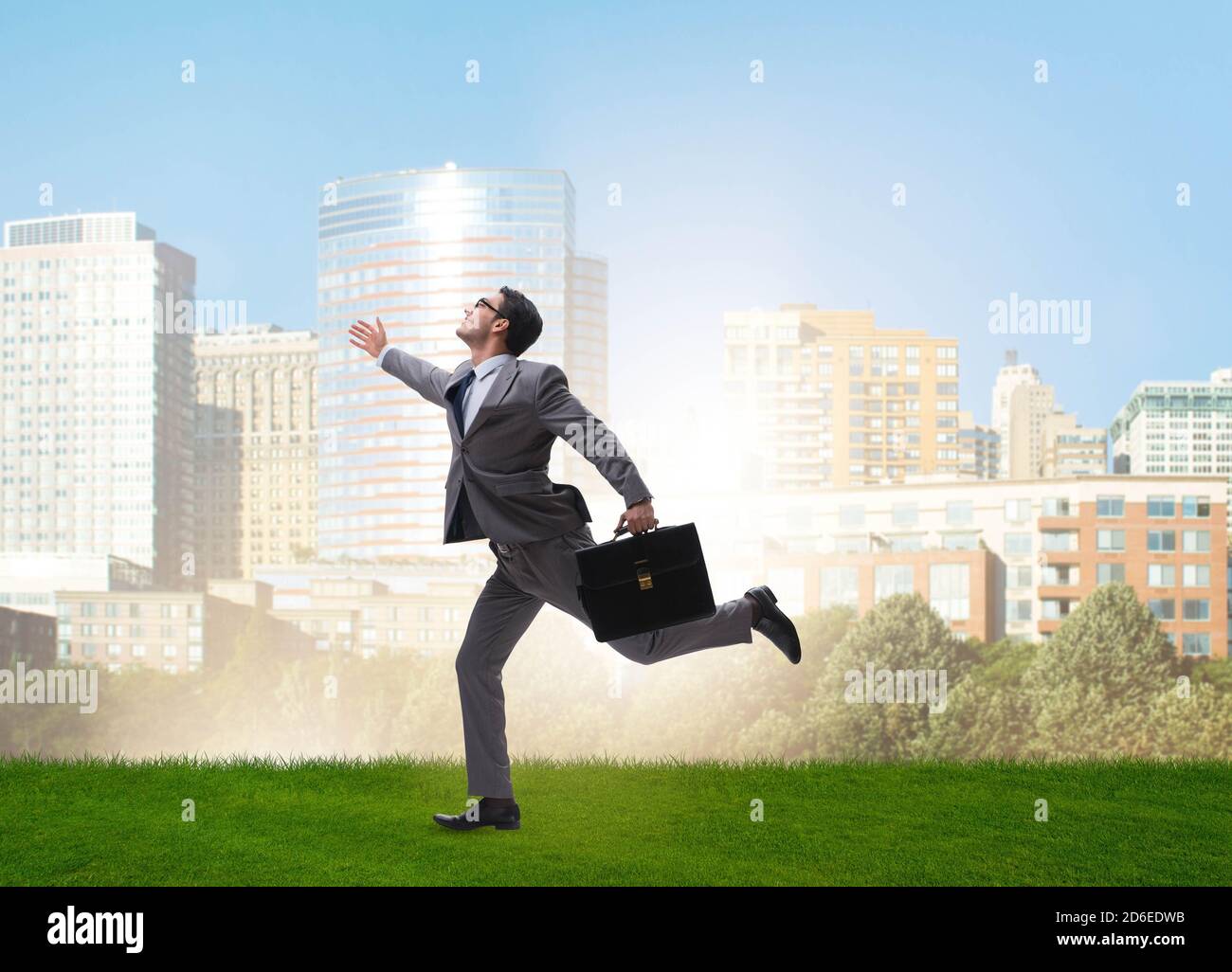 The happy businessman running towards his goal Stock Photo - Alamy