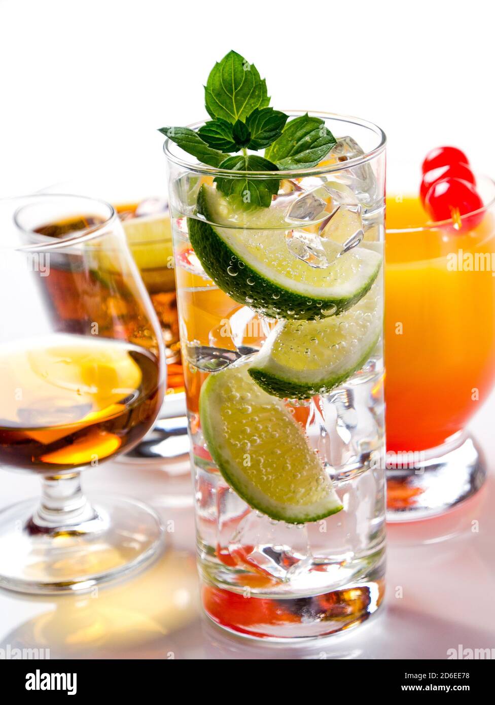 Various alcoholic cocktails on white background Stock Photo - Alamy
