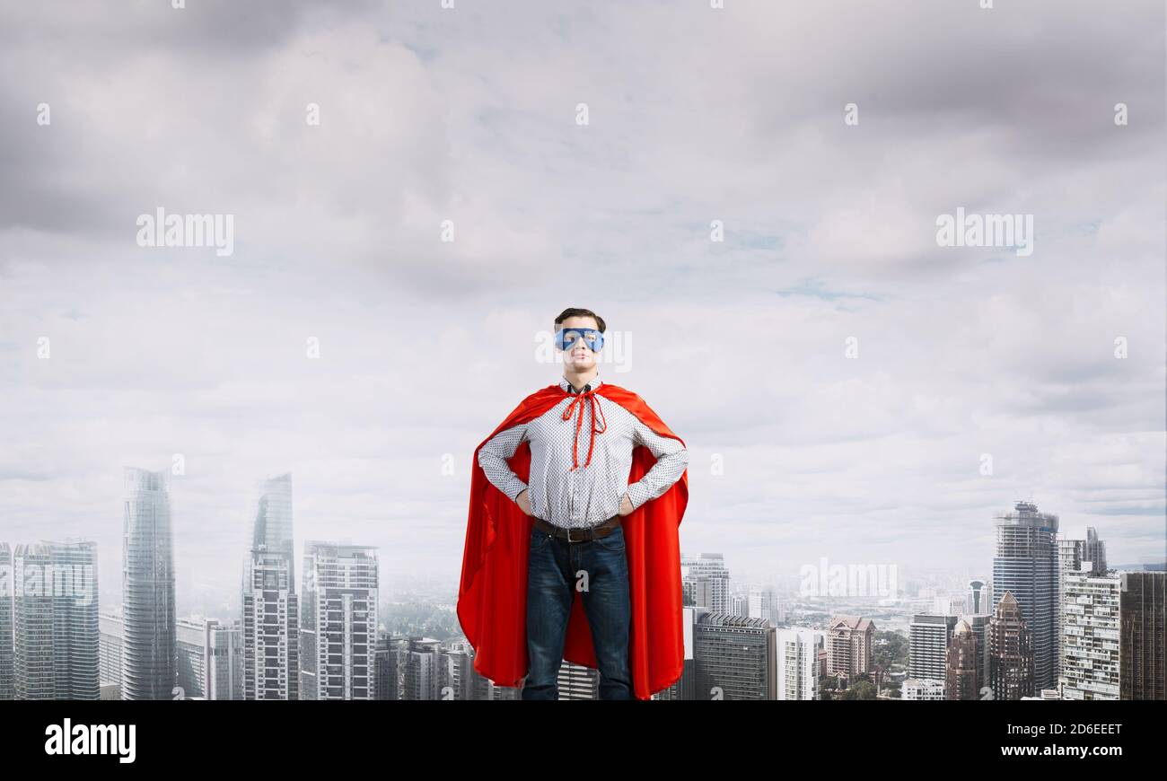 Confident super hero Stock Photo - Alamy