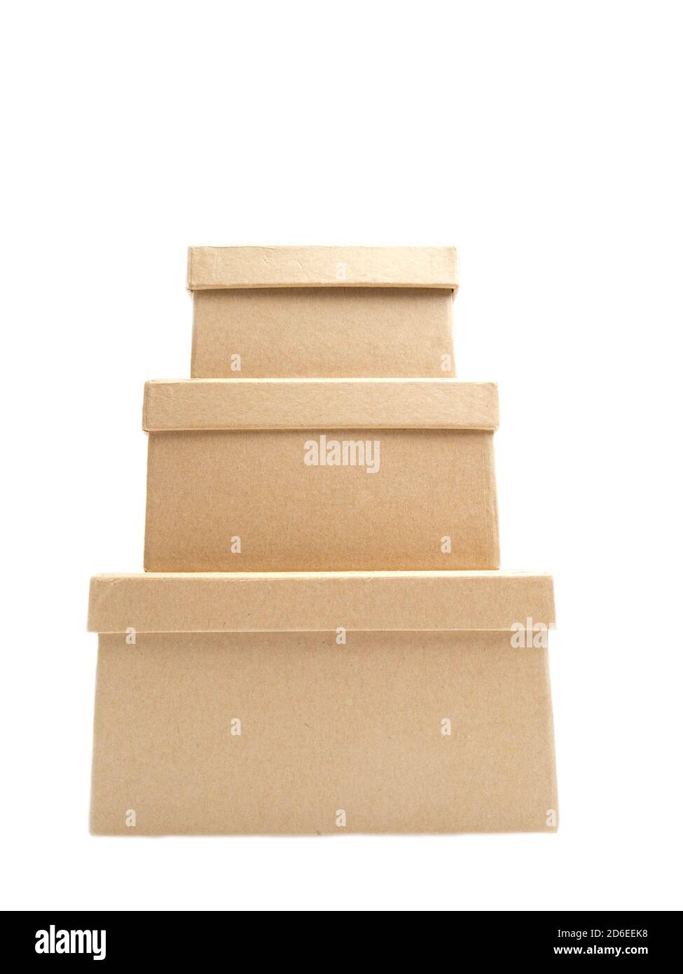 Three square paper boxes on white background, one on top of another ...