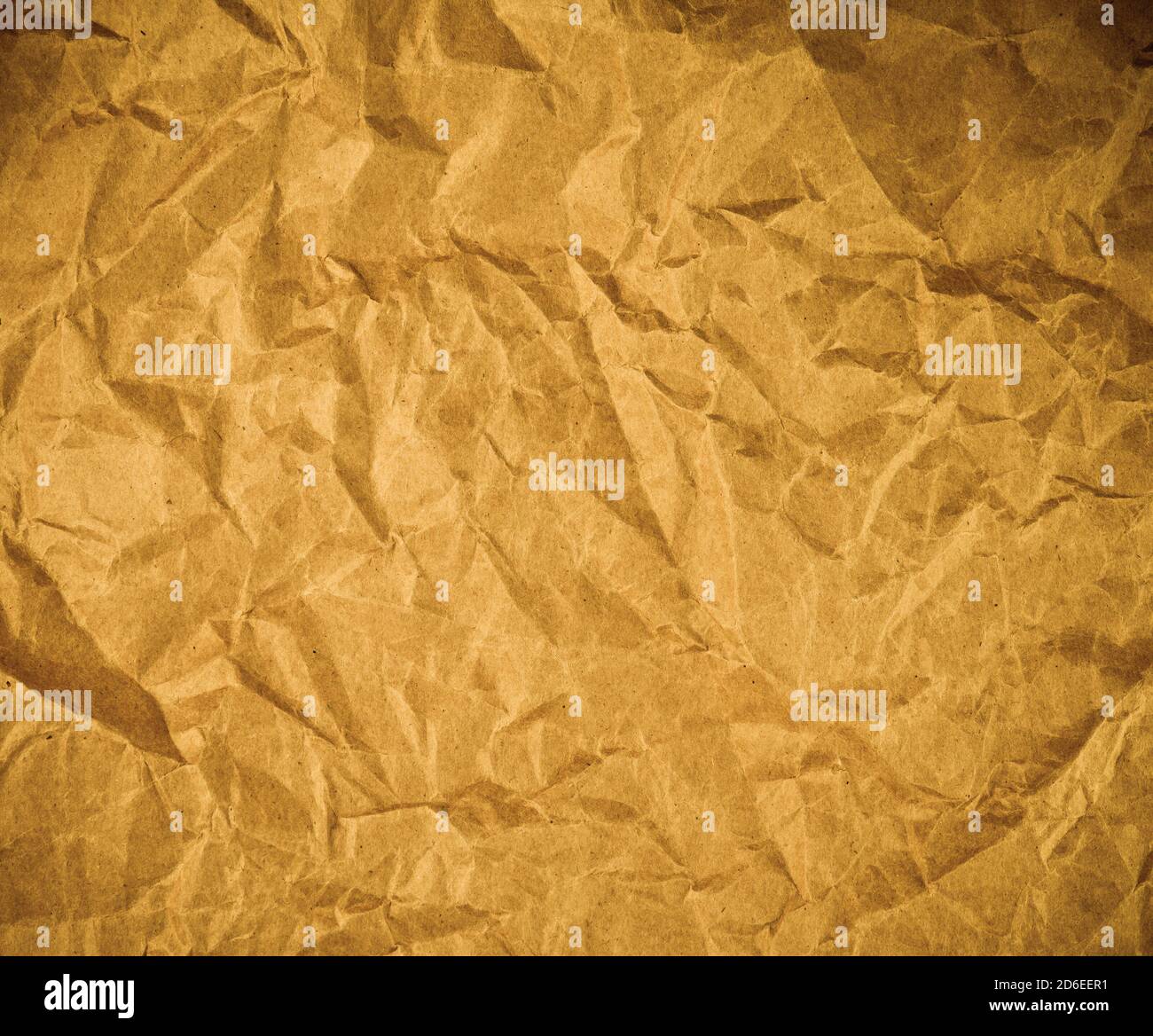 Brown wrinkled paper as a background Stock Photo - Alamy