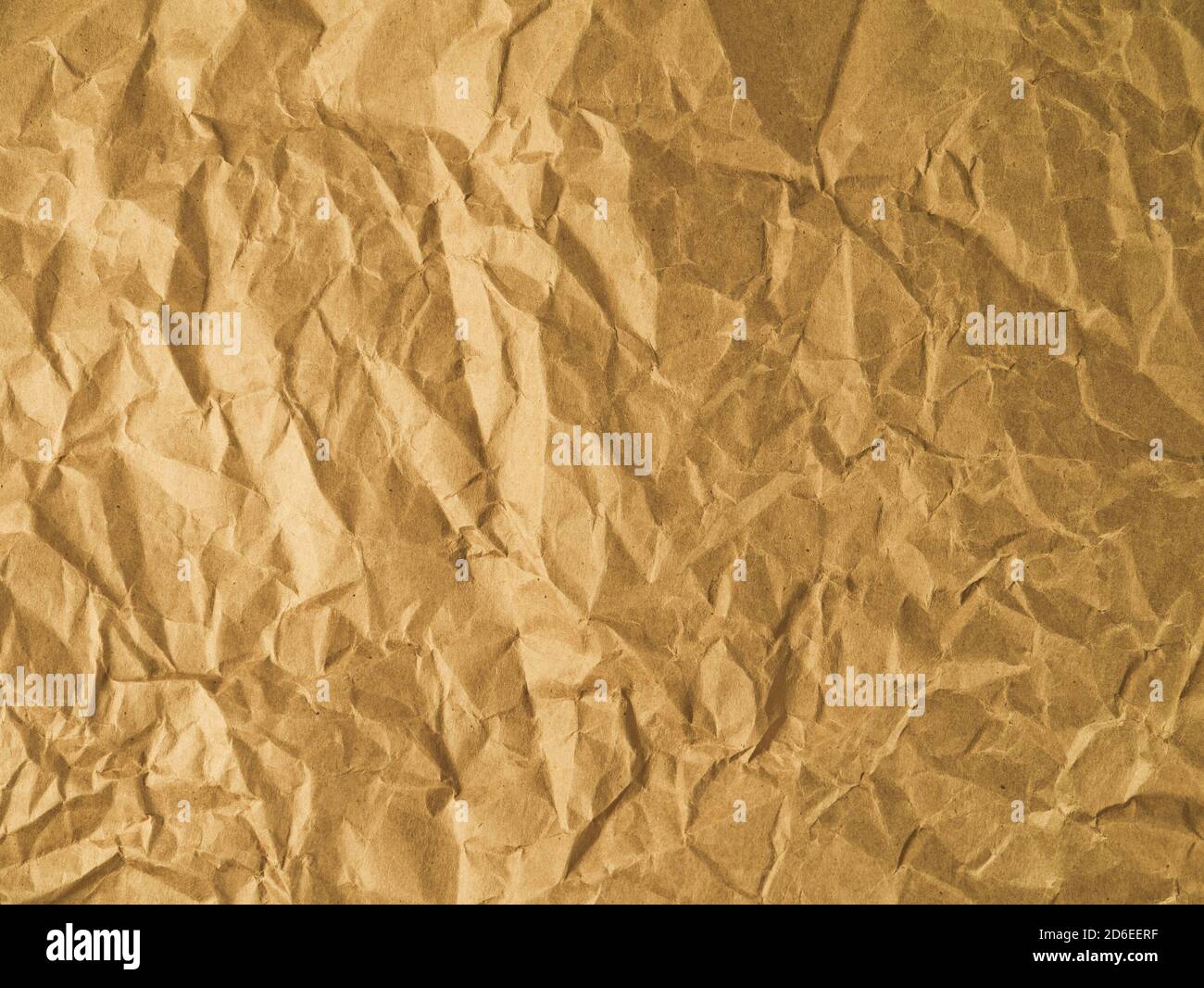 Yellow wrinkled paper as a background Stock Photo - Alamy